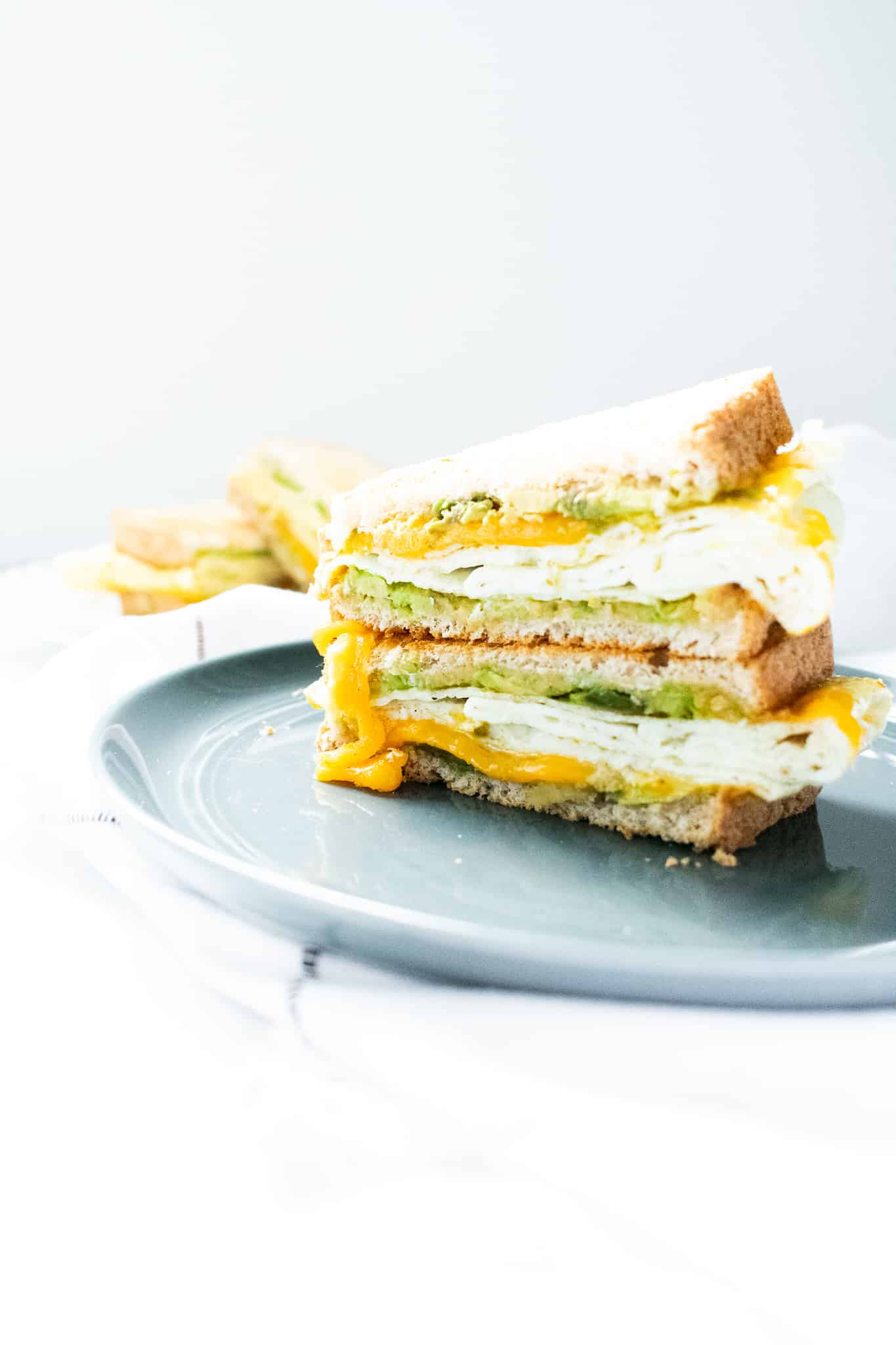 Avocado, Egg, & Cheddar Breakfast Sandwich - Bite your Cravings